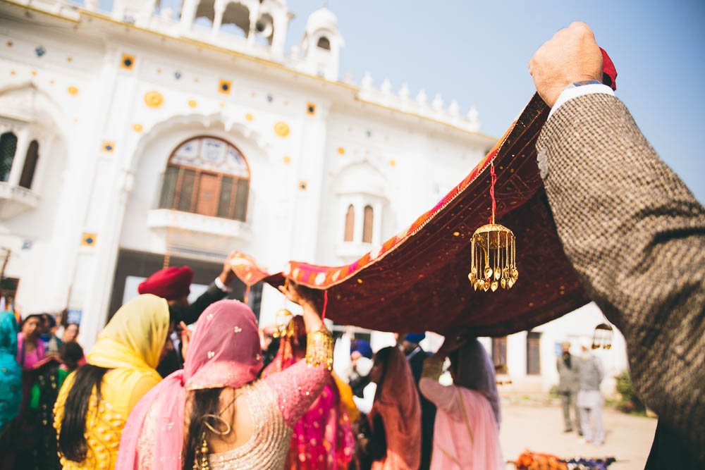 Fuchsia and Orange Wedding in India | Junebug Weddings